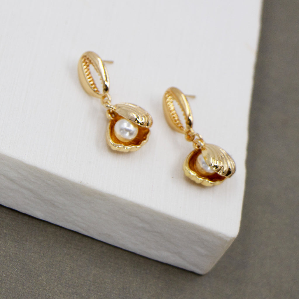 Cowrie shell post earrings with pearl in scallop shell – Tempest Designs