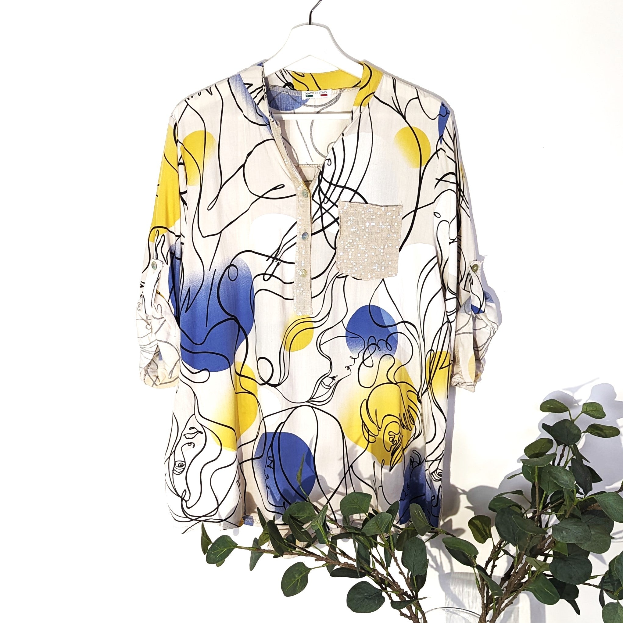 Face print shirt with subtle sequin neckline and pockets (M-L ...